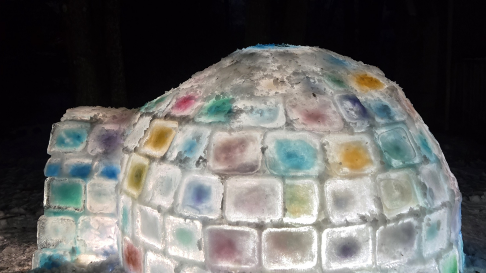 Blakeslee Stone Mason creates colorful igloo and ice sculptures